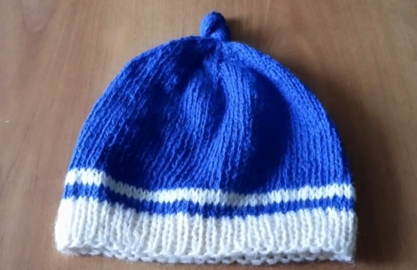 Шапочка для спортивного комплекта.