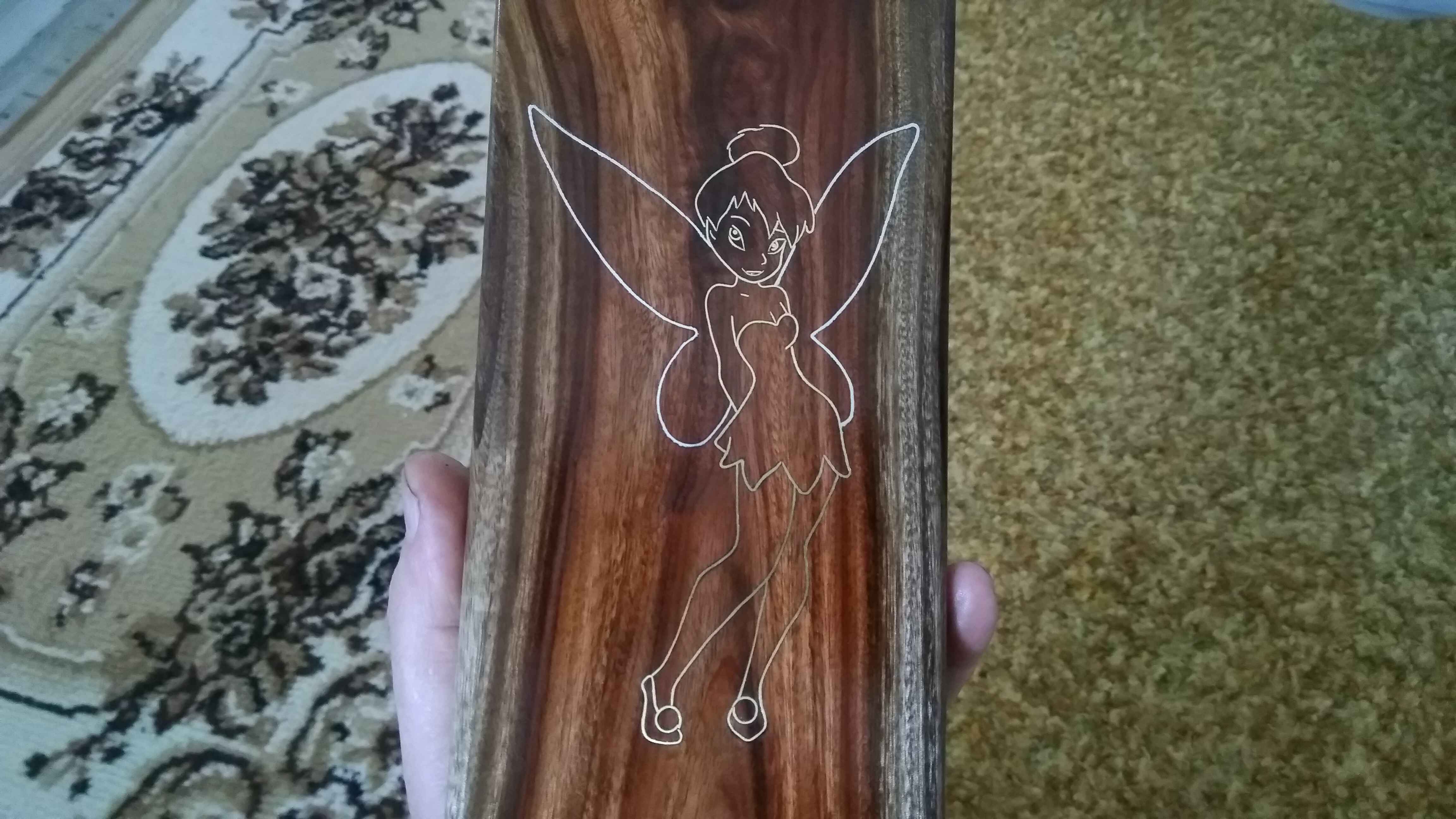 Феечка. Инкрустация на камфорном лавре латунью и алюминием.