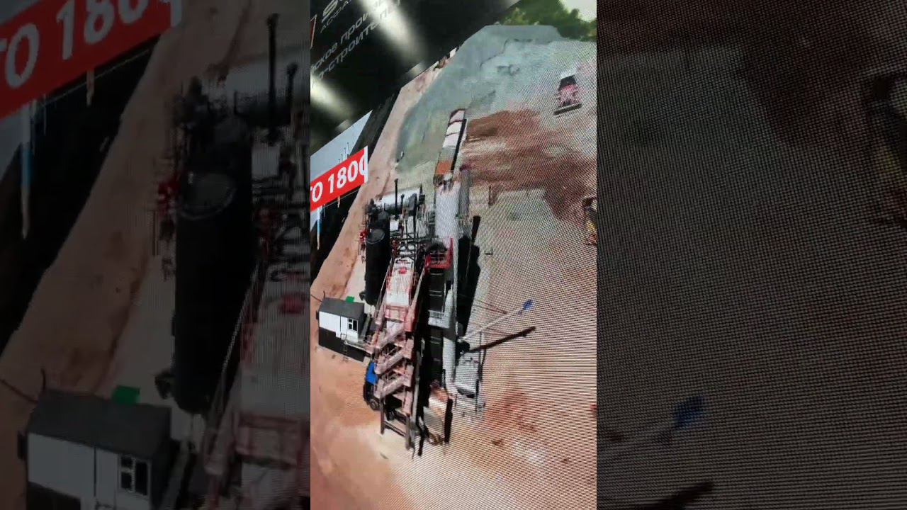 Ведущий Никита Бедретдинов. Строительная выставка. Стенд асфальтобетоного завода