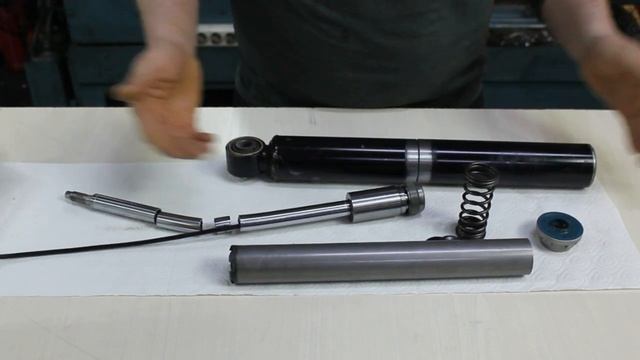 Ремонт амортизатора Porsche Macan Порш Макан.