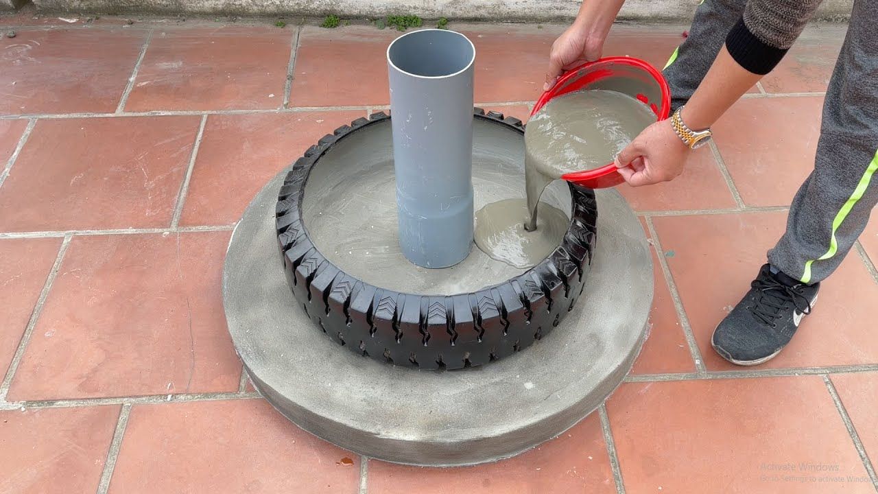 Напольный аквариум из автомобильной шины и цемента