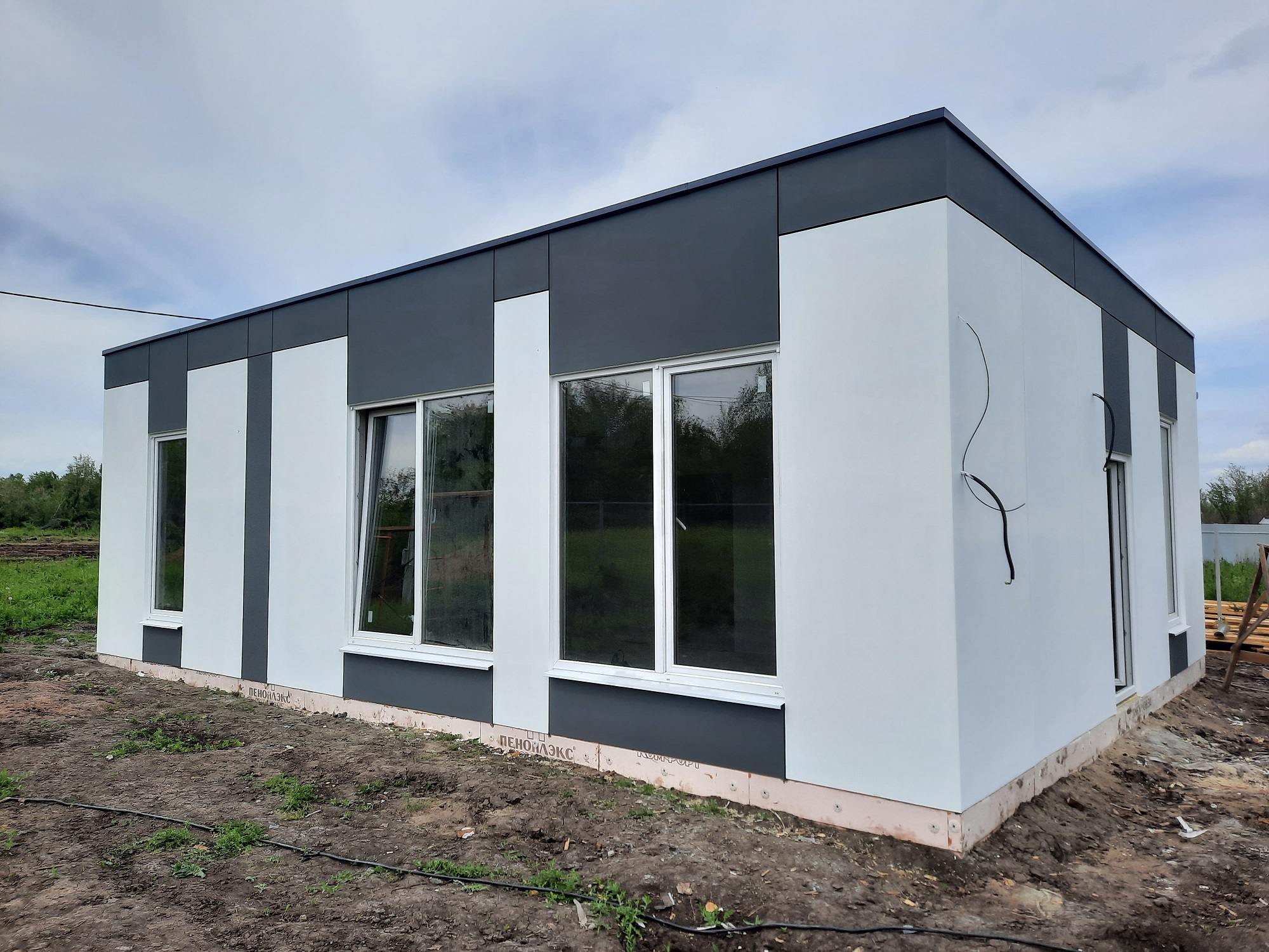 Внешняя и внутренняя отделка дома в стиле минимализм площадью 70 кв.м.