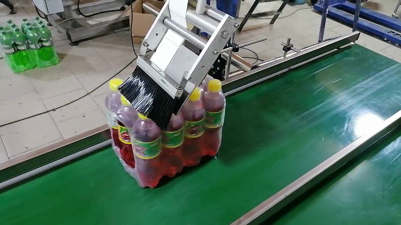 Нанесение этикетки на верх упаковки  -  EtiKon.ru