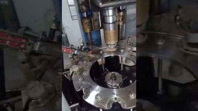 9/Укупорочная машина. Автомат укупоривания бутылок АУ210с бункером верхней подачи пробки