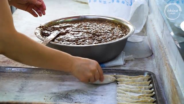 Chinese Street Food -fried Noodles with Egg，fried dumpling stuffed with beef