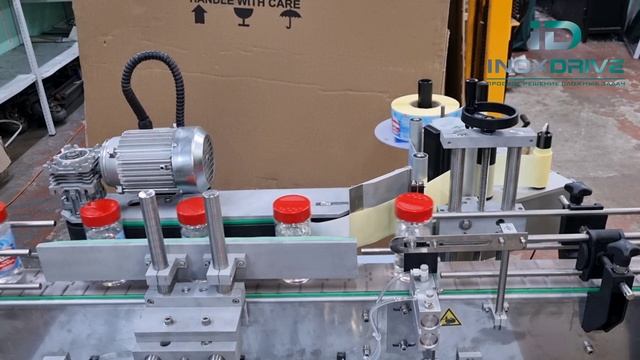 Этикетировочная система для нанесения круговой этикетки на банки с солью - ИноксДрайв