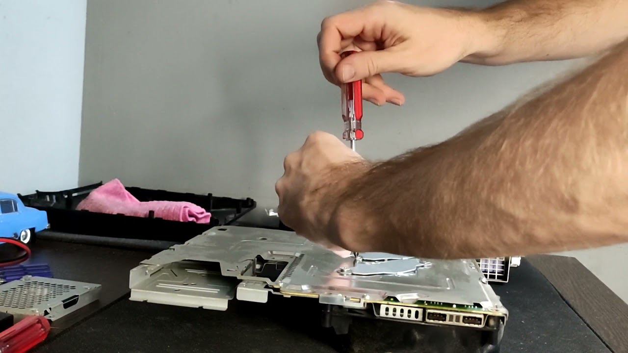 Как разобрать Sony PlayStation 3 Slim 3008А и поменять термопасту (PS 3 Slim 3008A)