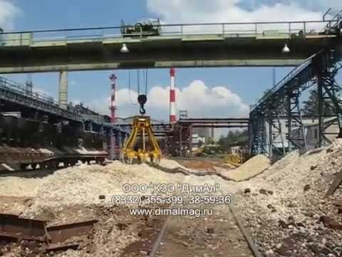 Перегрузка щебня моторным грейфером