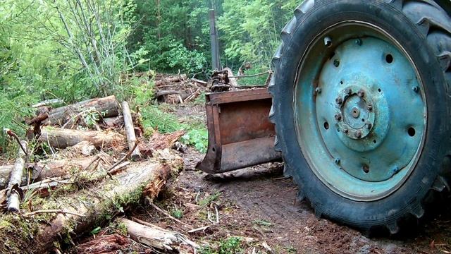 Трактором Т-40 восстанавливаем дорогу