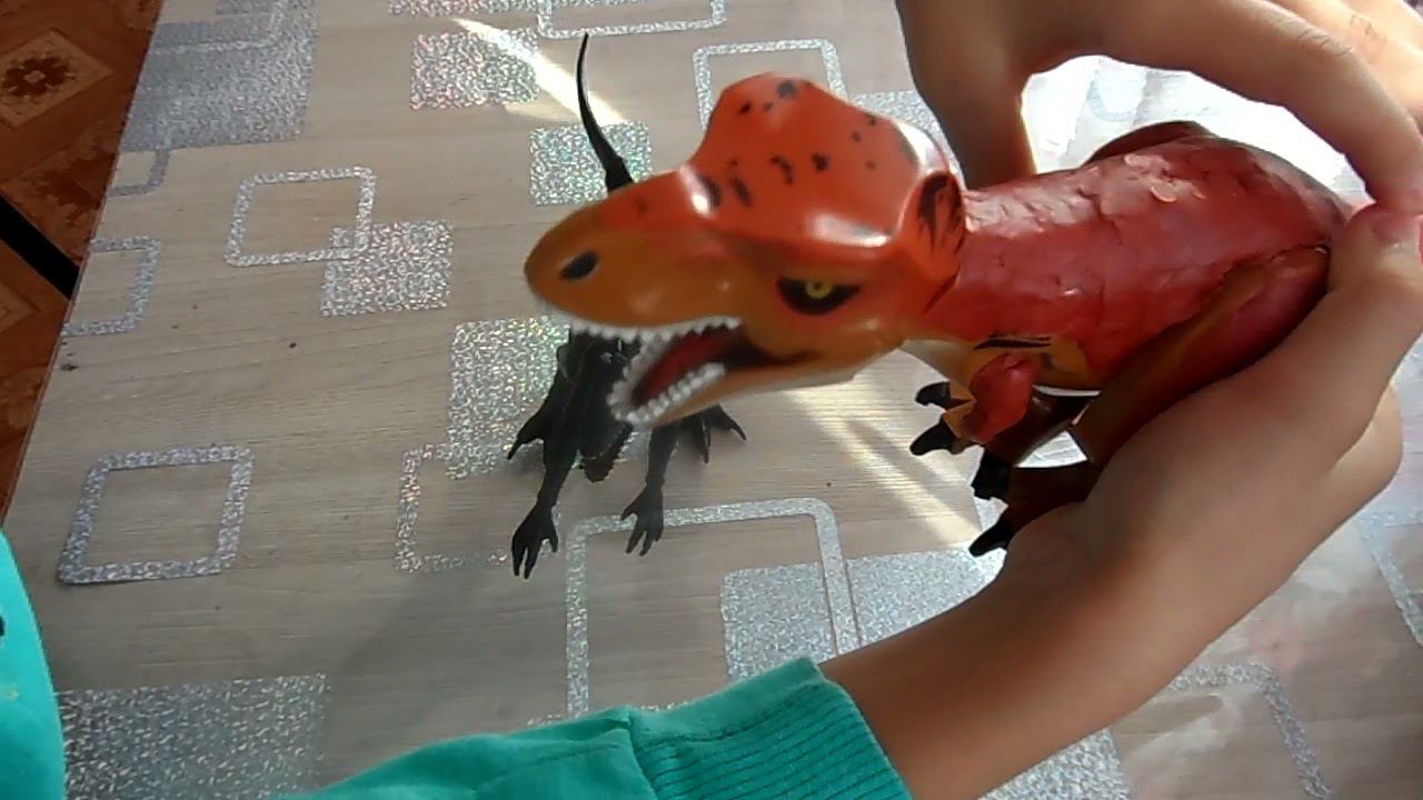 Обзор посылки. Обзор динозавра Индораптор и других динозавров.