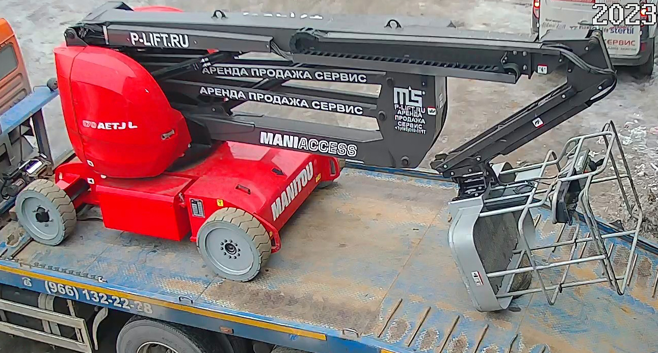 Разгрузка электрического подъемника Manitou 170 AETJ-L зимой