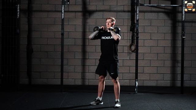 Приседания с гирями на груди