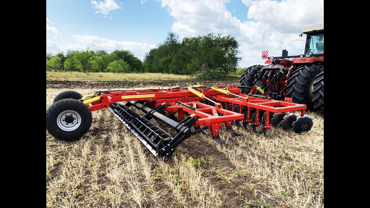 Работа бороны дискочизельной БДЧ 5С РОСОМАХА производства БДТ-АГРО с трактором Кировец в Румынии