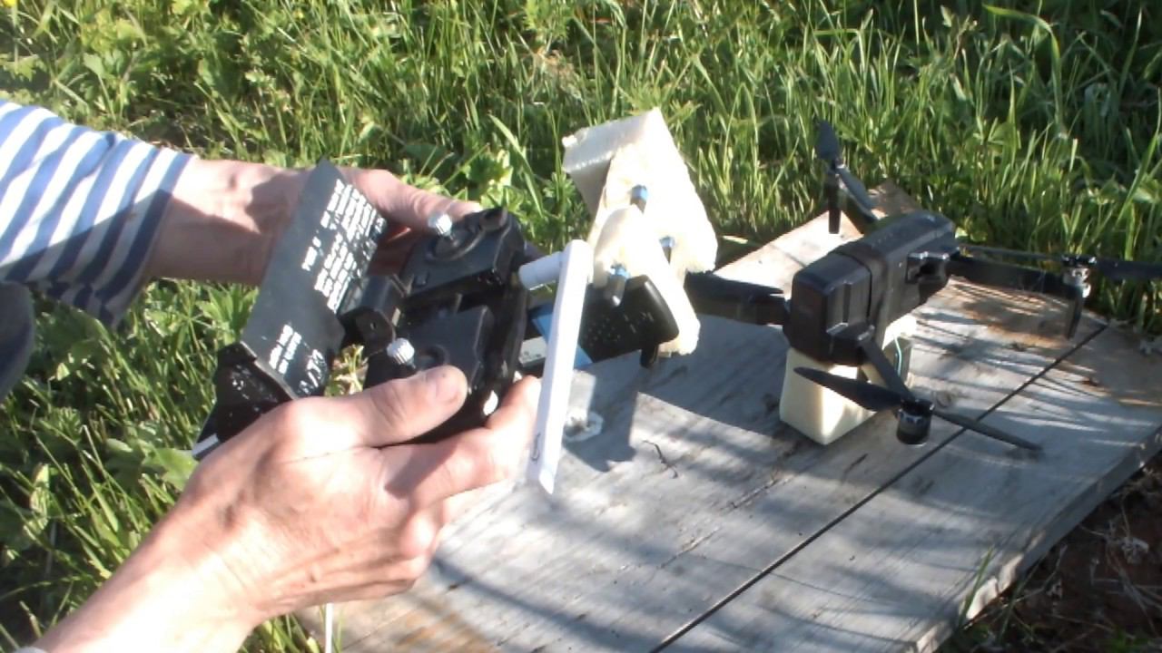 Дрон SJRC F11- крепление репитера Comfast CF-WR371AC на пульте