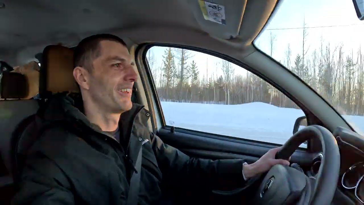 На дастере по снежной дороге