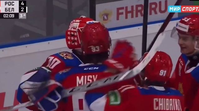 Российский голкипер Дмитрий Николаев забросил шайбу в матче с Беларусью  смотреть видео