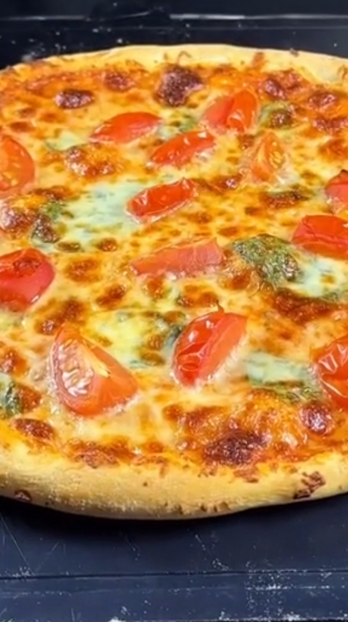 Очень вкусная пицца.