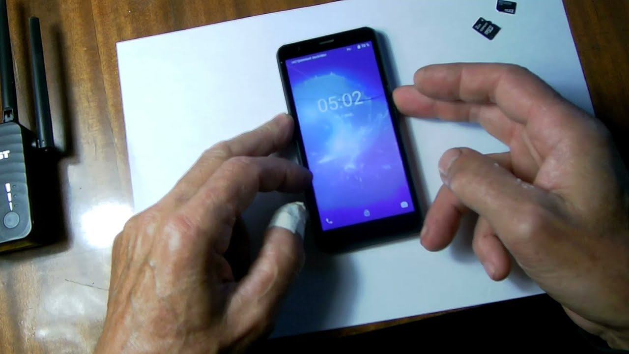 ZTE Blade L8 - установка сим карт и sd-карты