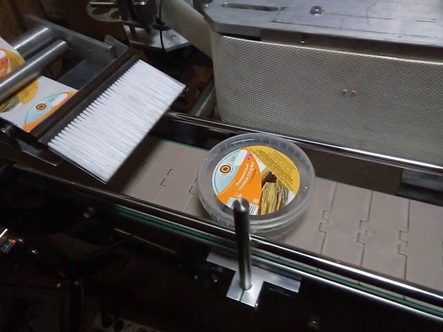 Наклеивание этикетки на крышку банки 2 -  EtiKon.ru