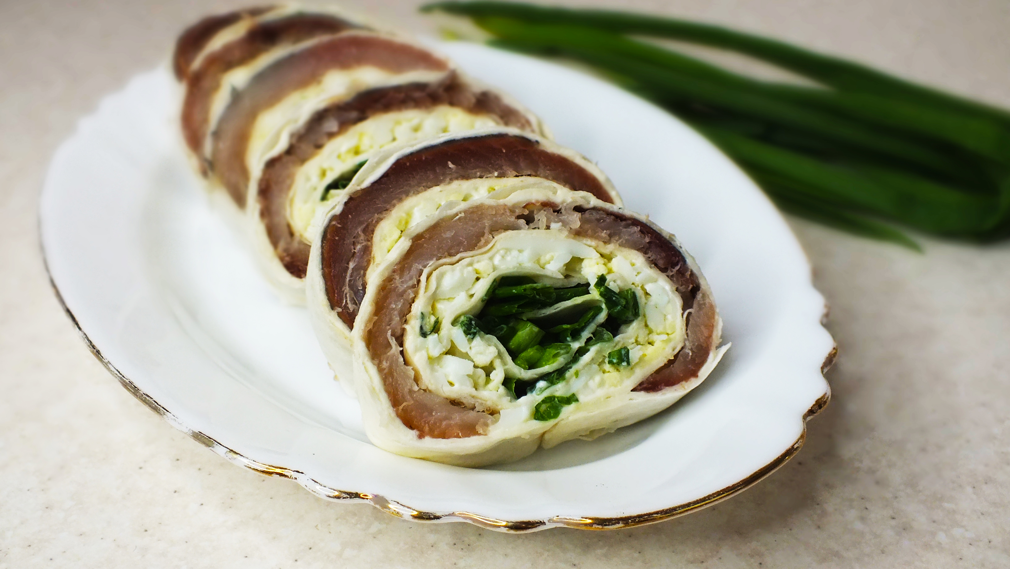 Рулетики из лаваша с селедкой