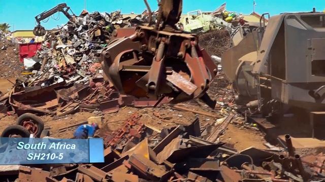 Экскаватор SH210-5 с грейферным захватом. Южная Африка