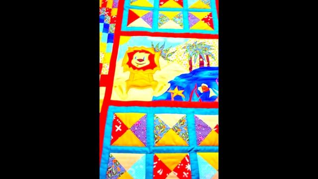 Детское лоскутное одеяло" Львенок и море" в стиле пэчворк.