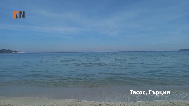 На пляже в Потосе, остров Тасос, Греция