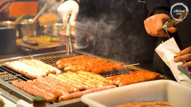 Chinese Street Food -Night market egg fried rice fried noodles, Taiwanese sausage, fried skewers