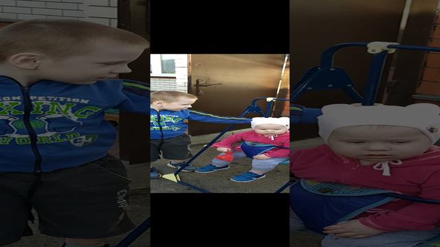 На качелях. Во дворе.