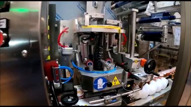 Автоматический аппликатор рукавной термоусадочной слив-этикетки (Sleeve-этикетки).-(1080p30).webm