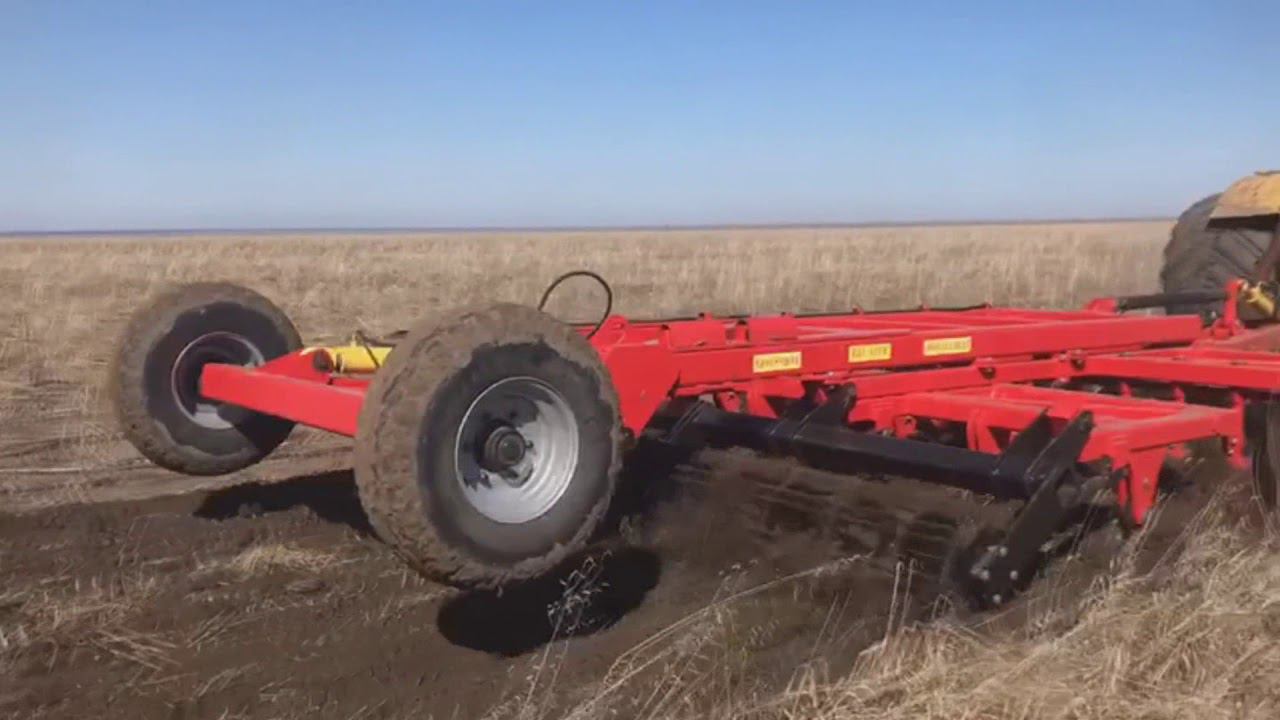 Работа бороны дискочизельной БДЧ 4х4 РОСОМАХА производства БДТ-АГРО с трактором К700А