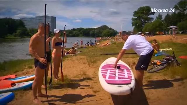 SUP серфинг на передаче  Жизнь в большом городе