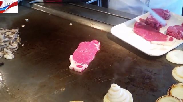 Приготовления говядины японским поваром