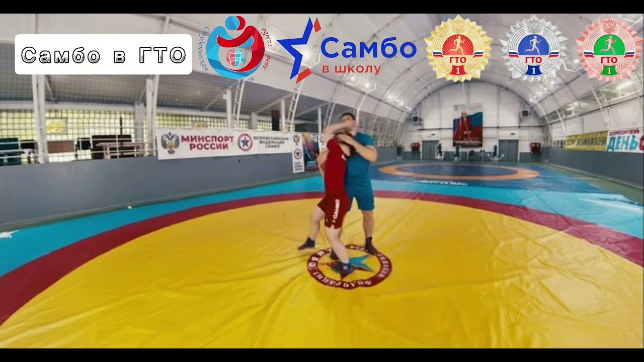 Самозащита. Действия ассистента: выполняет захват за шею плечом и предплечьем сзади