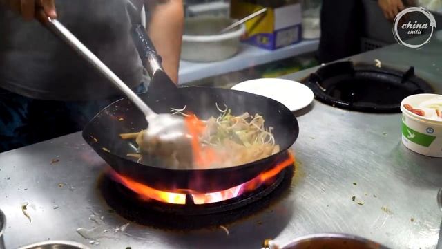 Chinese Street Food -Professional master chef fried rice with eggs  fried noodle collection